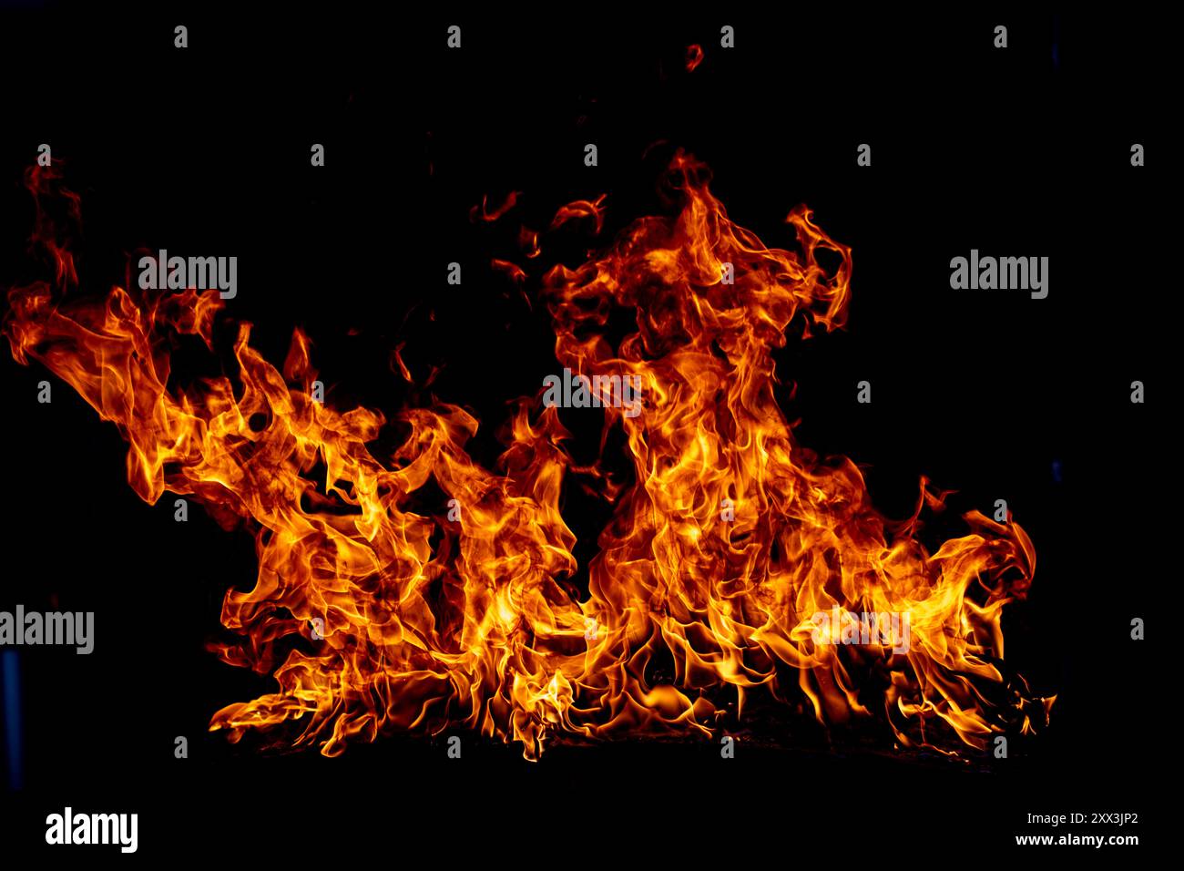 Blaze burning fire flame on art texture background Stock Photo - Alamy