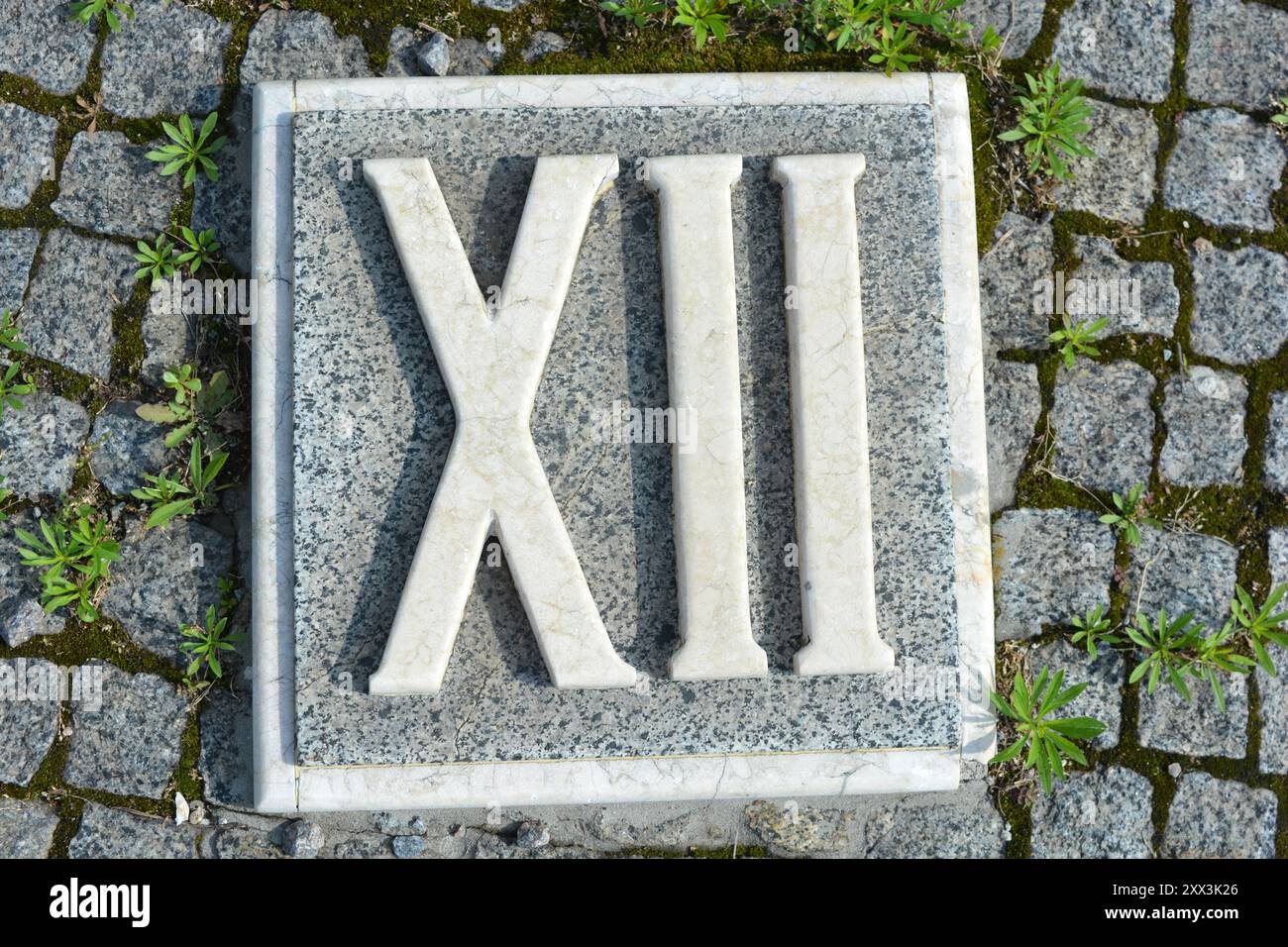 Building materials, memorials, white inscriptions in gray, brown ...