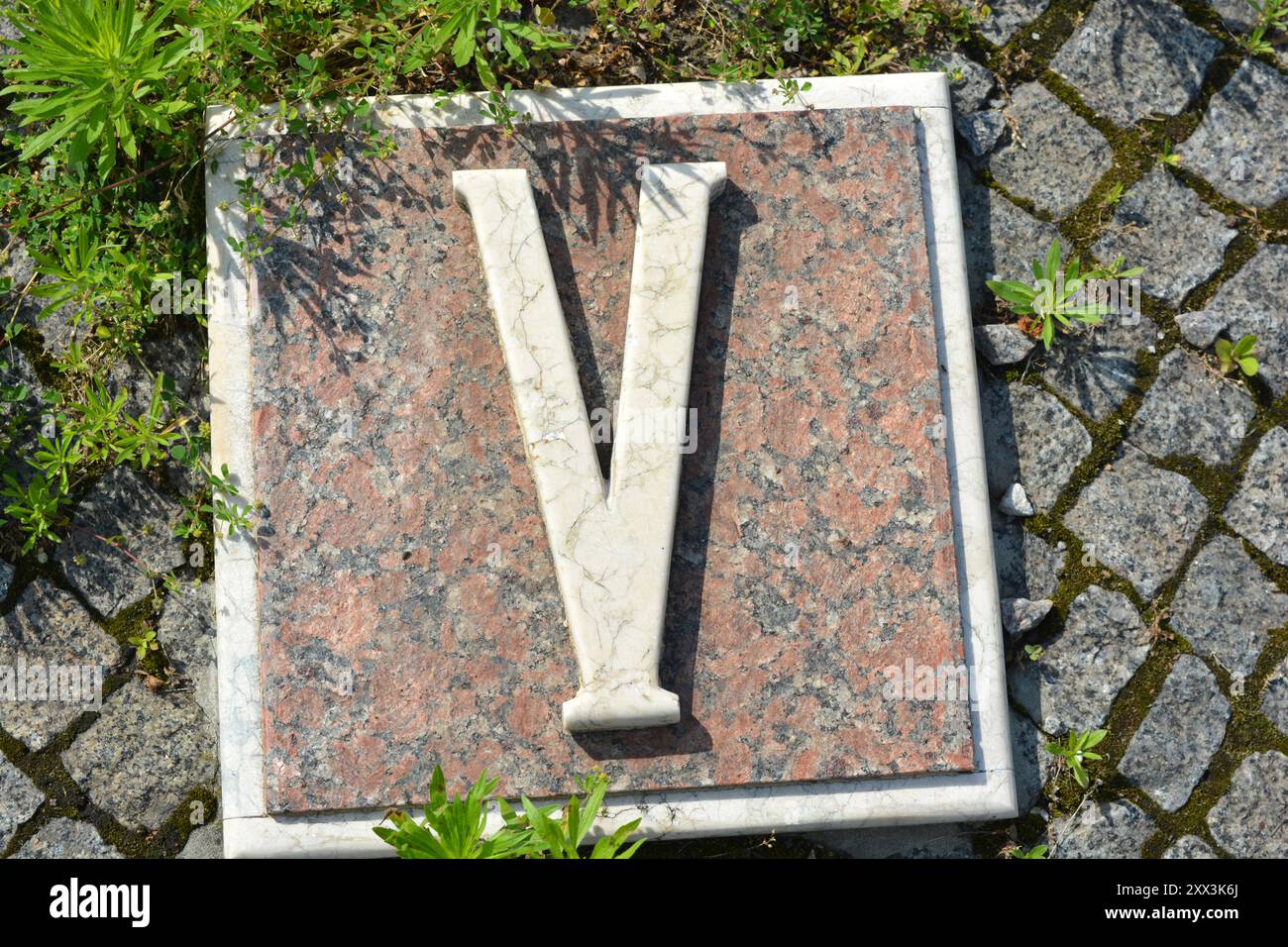 Building materials, memorials, white inscriptions in gray, brown ...