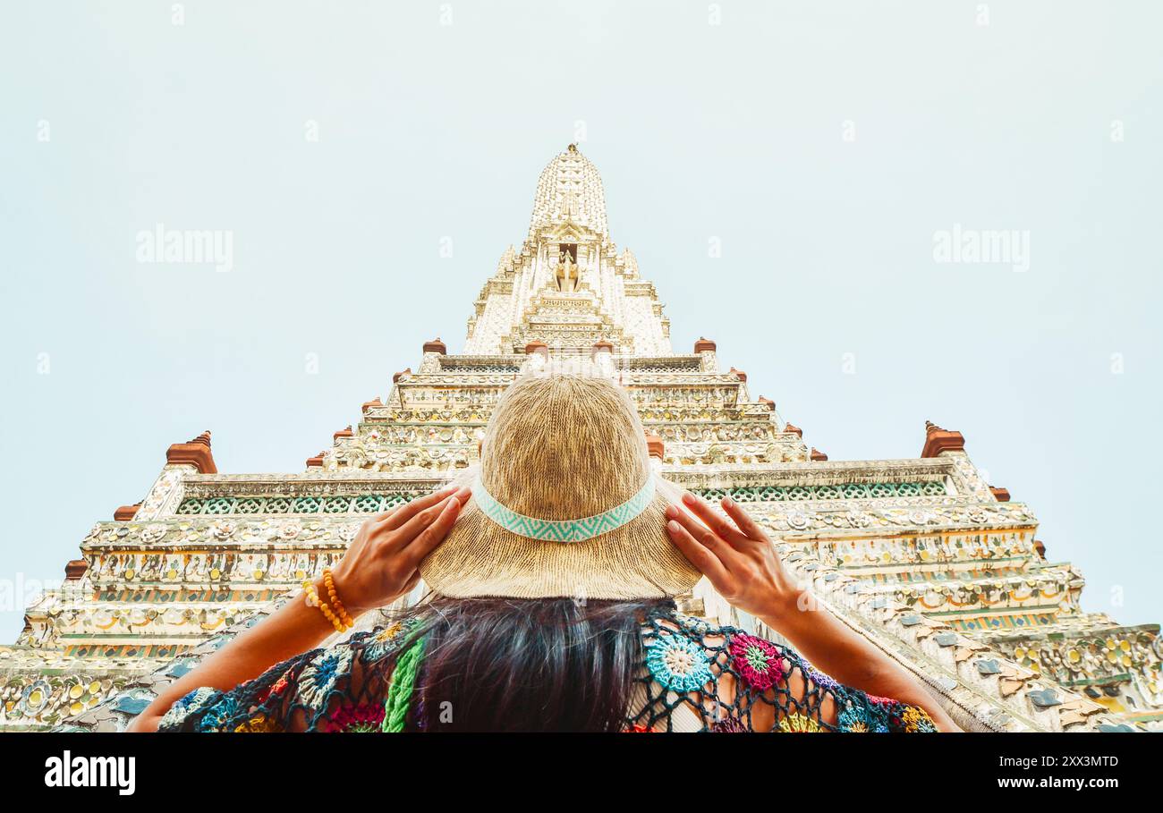 Young woman traveler blogger pose back view by beautiful popular ...