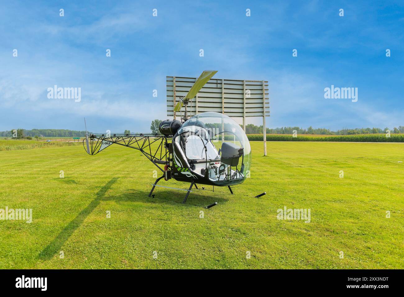 Helicopter in Field Stock Photo - Alamy