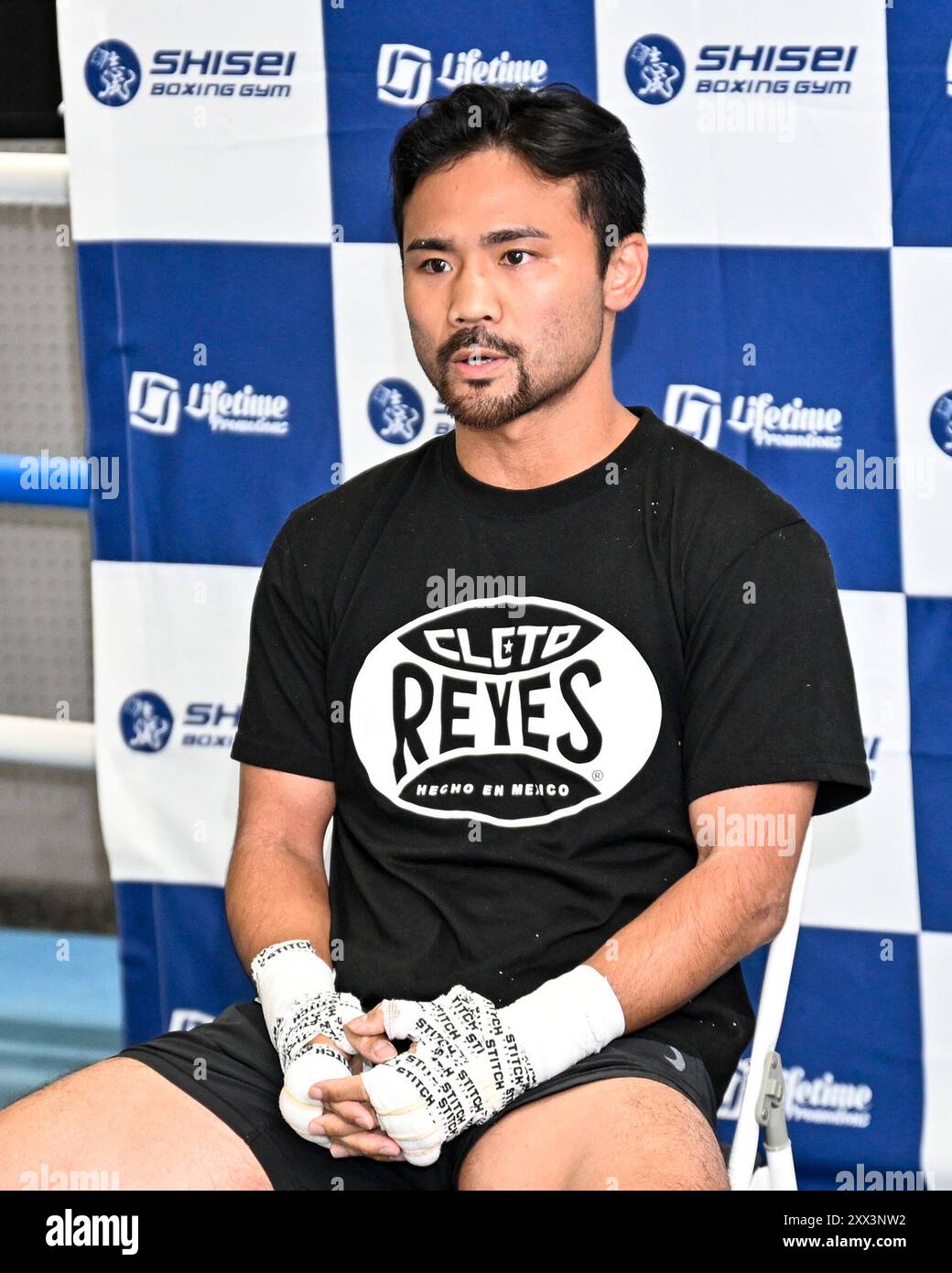 Tokyo, Japan. 19th Aug, 2024. Japan's Daigo Higa talks to the media during a public workout at ...
