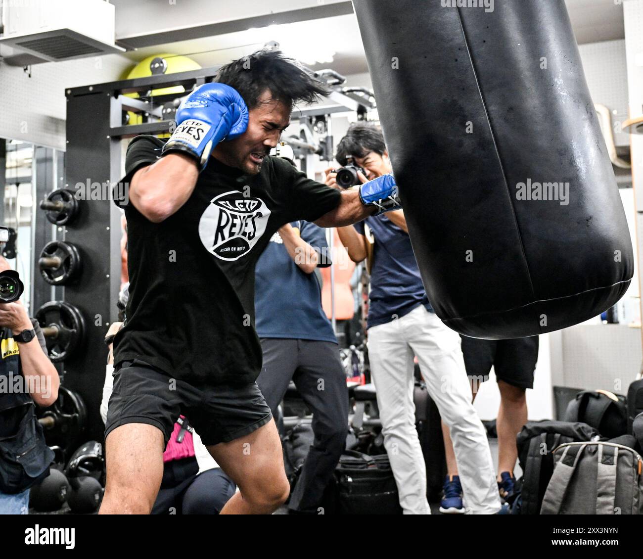 Tokyo, Japan. 19th Aug, 2024. Japan's Daigo Higa hits a heavy bag ...