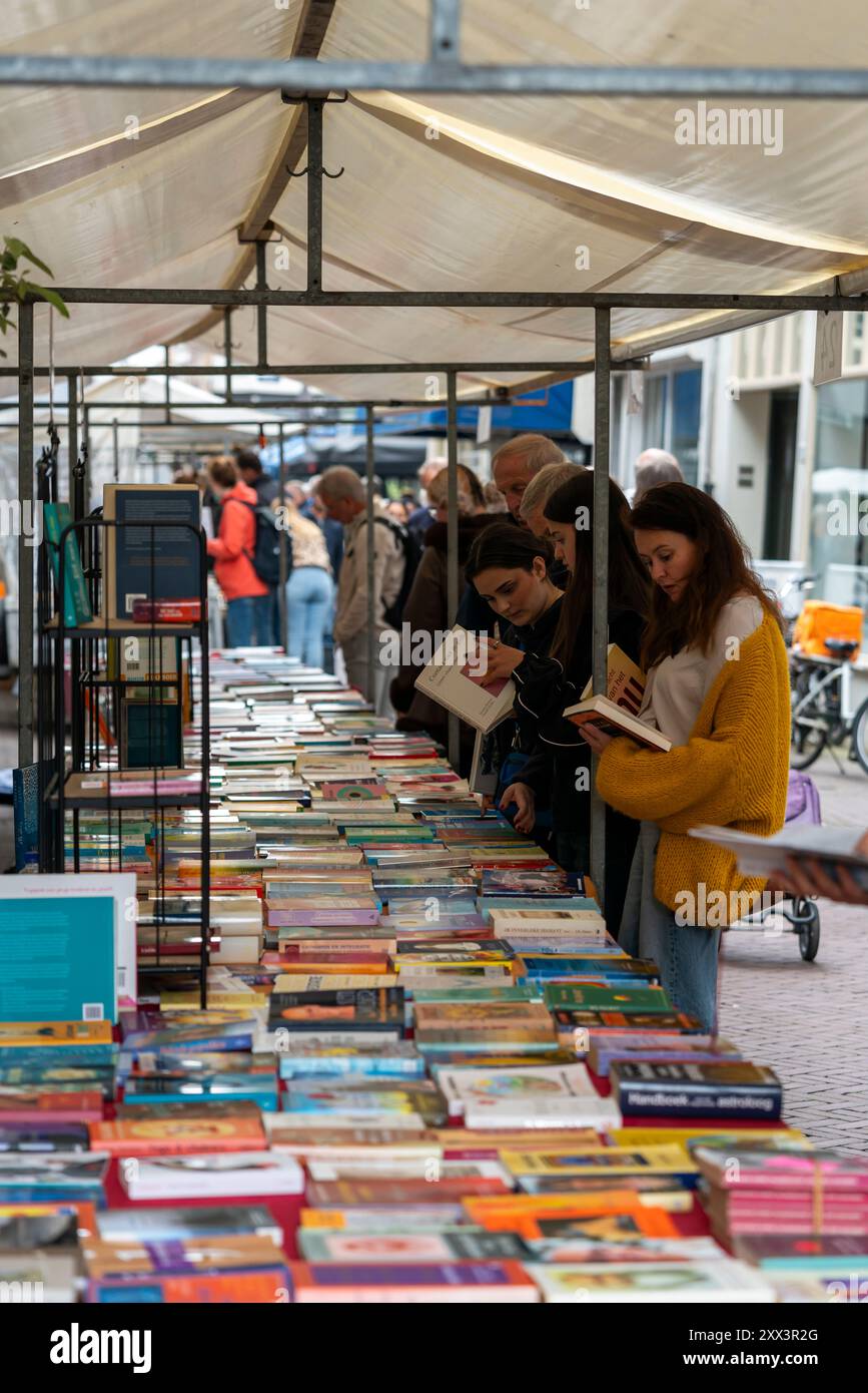 Dordrecht, Netherlands - July 7, 2024: Visitors explore second-hand ...