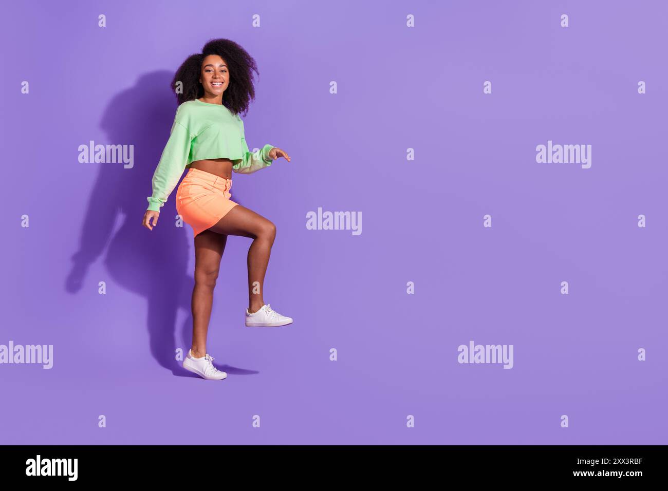 Full body length photo of young american girl wavy curly hair chevelure ...