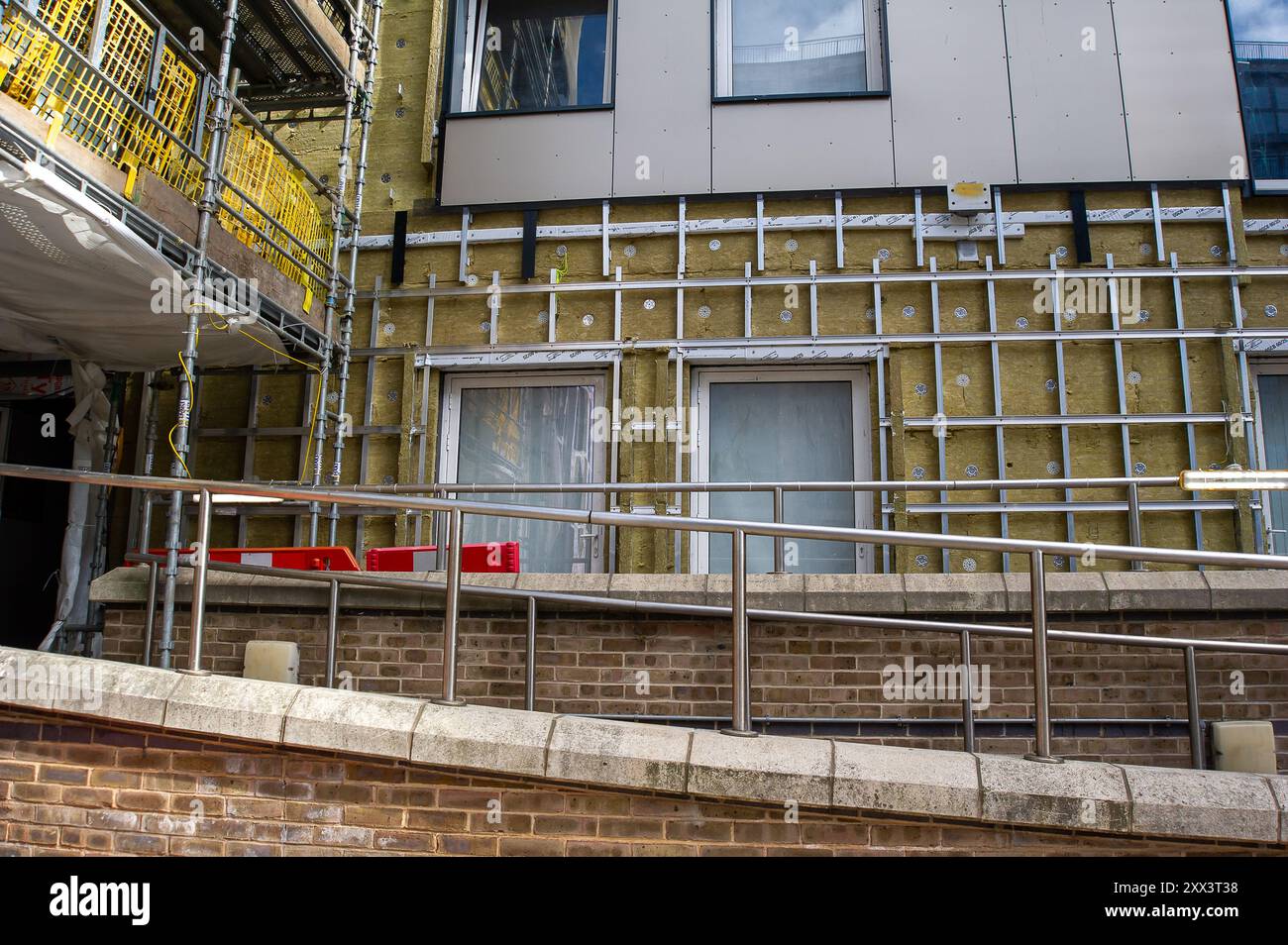 Slough, Berkshire, UK. 14th August, 2024. Cladding being removed from ...