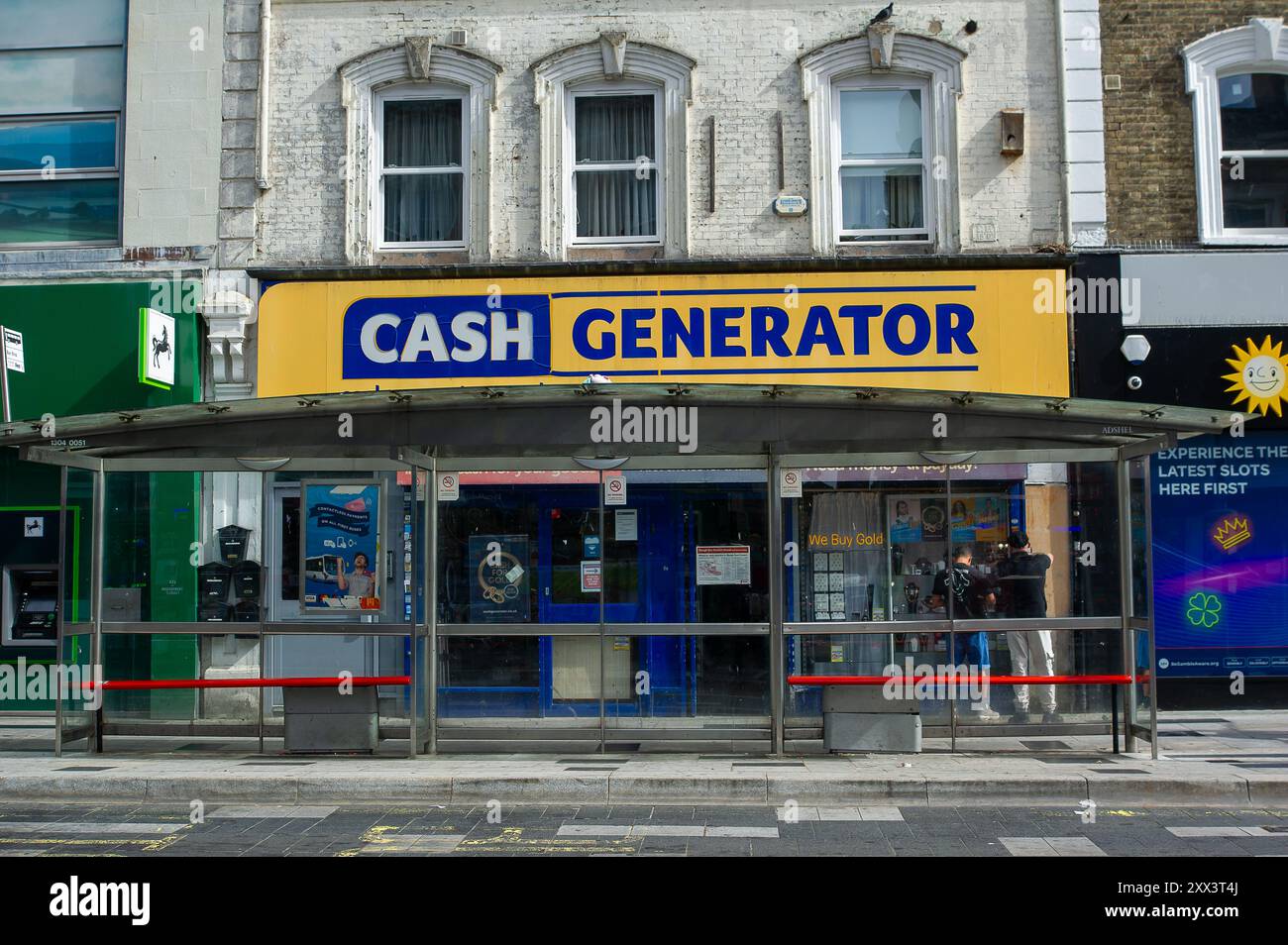 Slough, Berkshire, UK. 14th August, 2024. A Cash Generator shop in ...