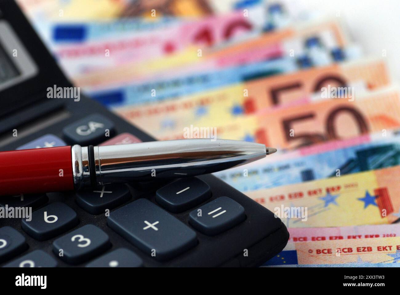 Concept photo of calculator, pen and european currency EURO Stock Photo ...