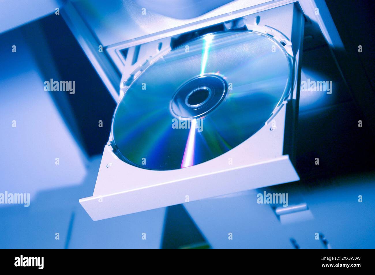 Concept photo of a data CD in a computer Stock Photo - Alamy