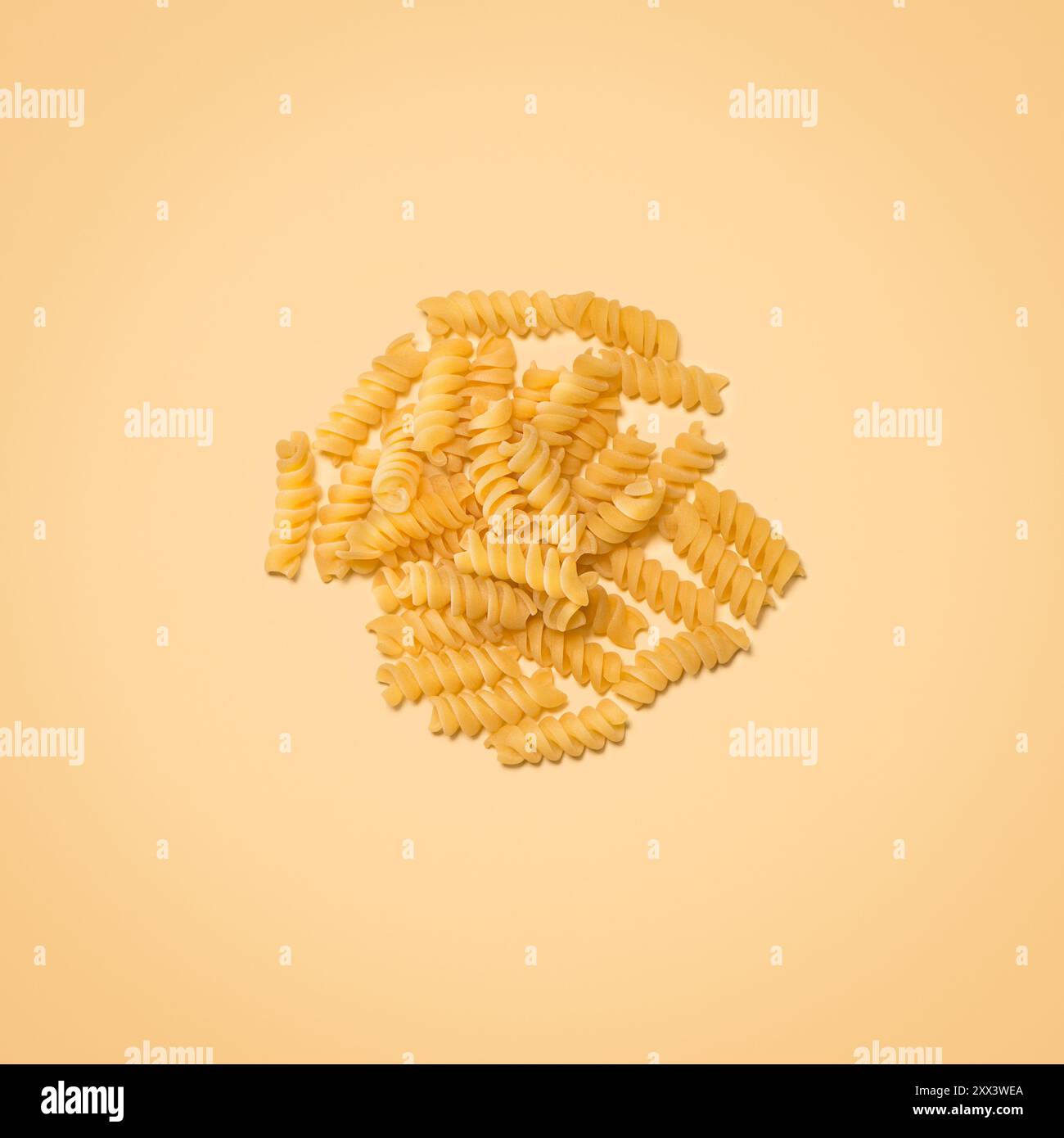 Pasta, food and starch for lunch in studio background with wheat ...