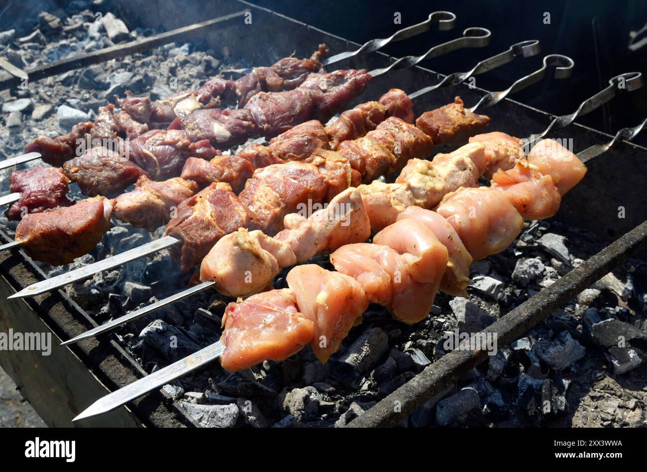 Barbecue frying on a charcoal grill, meat Stock Photo - Alamy