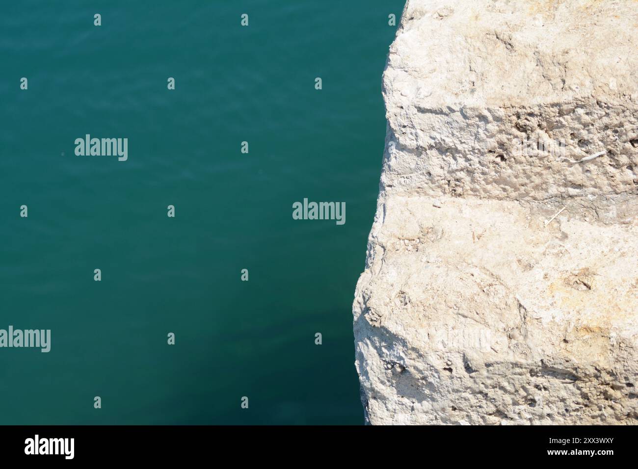 an old stone dock detail and sea water surface suitable room for your ...