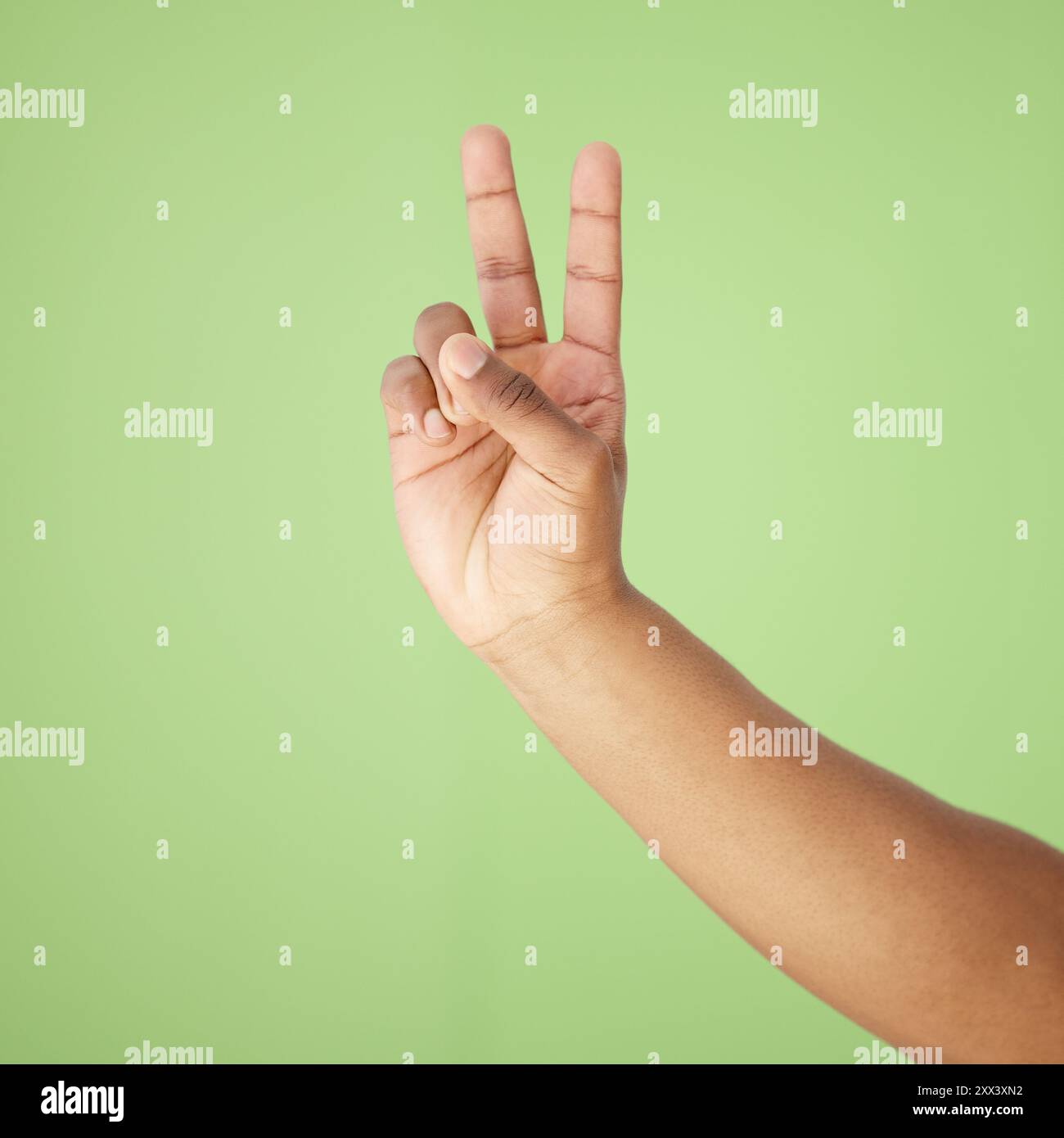 Hands, person and peace sign with emoji in studio for advertising ...