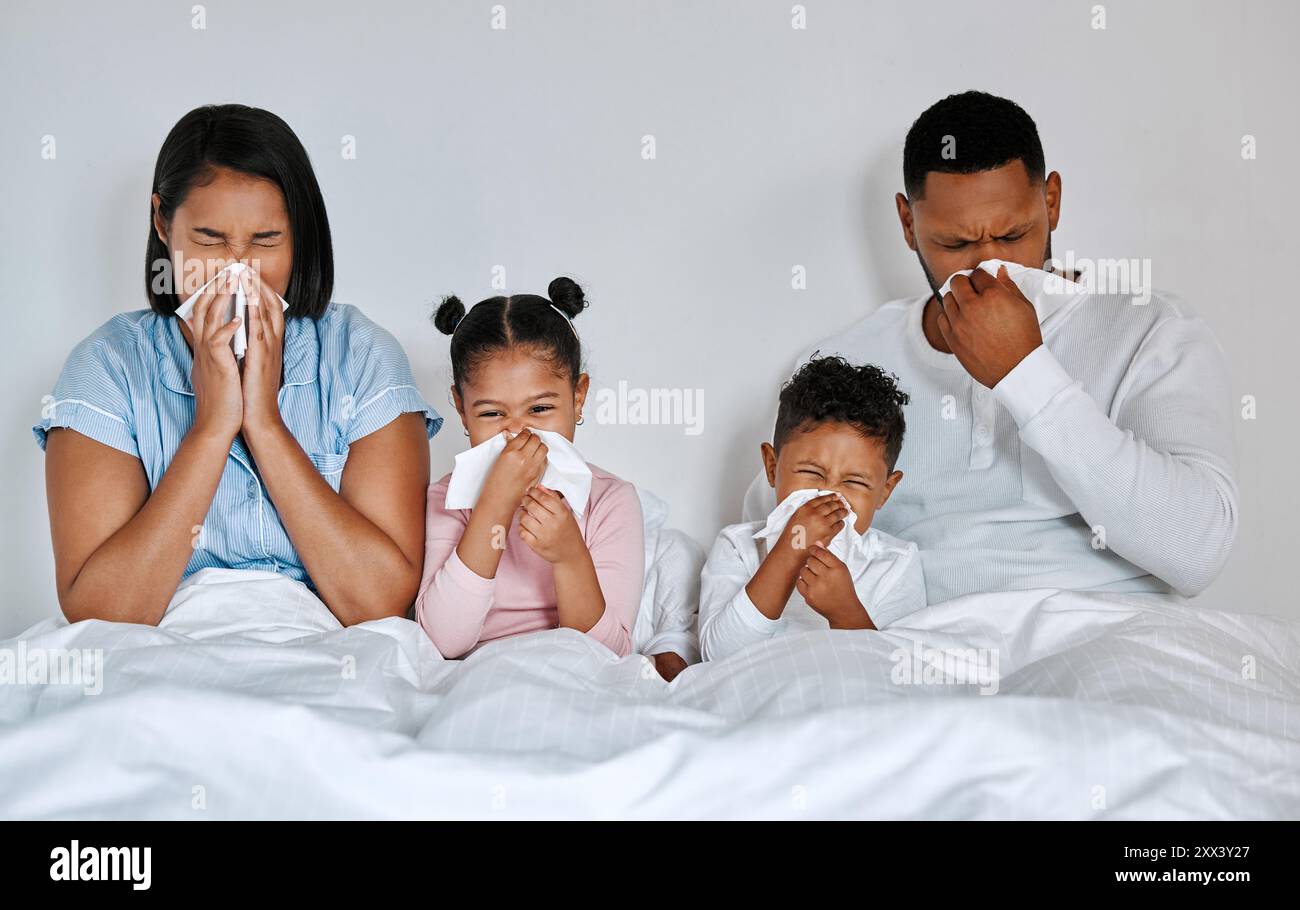 Family, sick and blowing nose in bed with flu, allergies and common ...