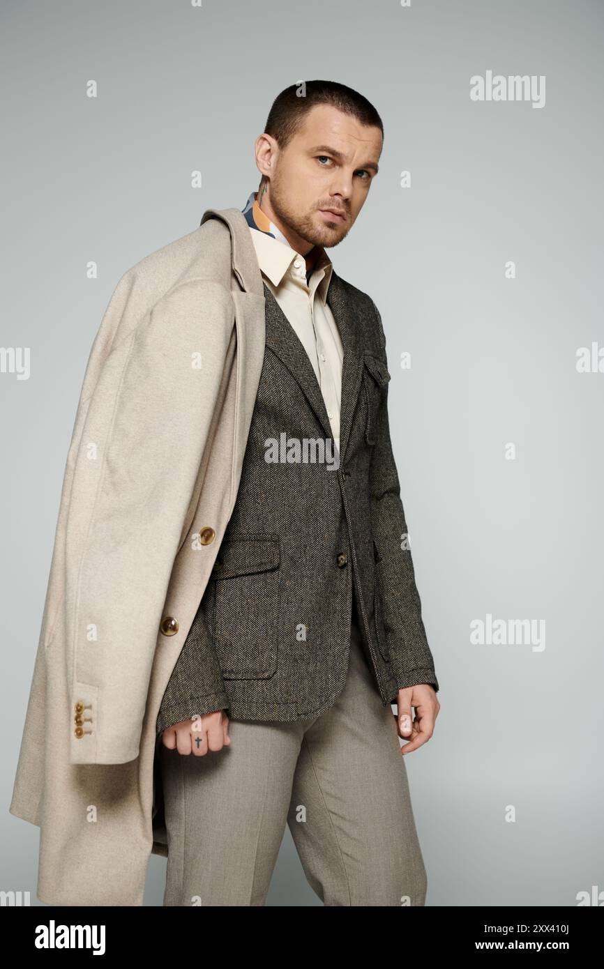 Cream colored suit hi-res stock photography and images - Alamy