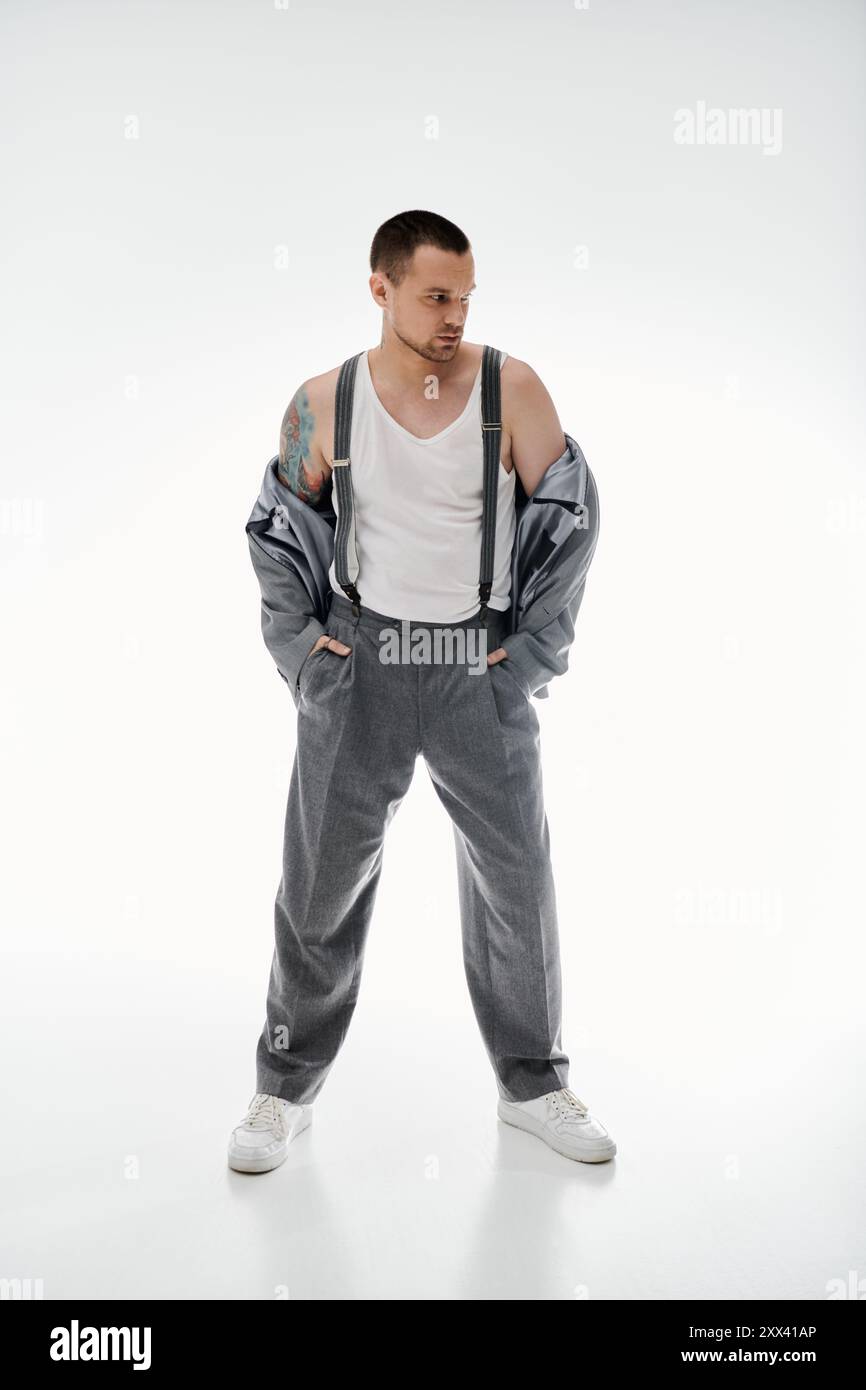 Grey jacket over shoulders hi-res stock photography and images - Alamy