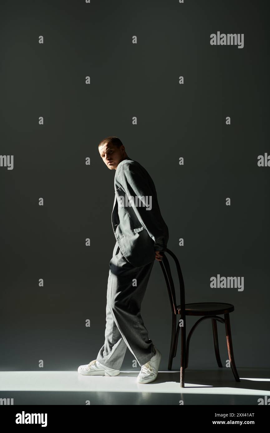 Single person walks past hi-res stock photography and images - Alamy