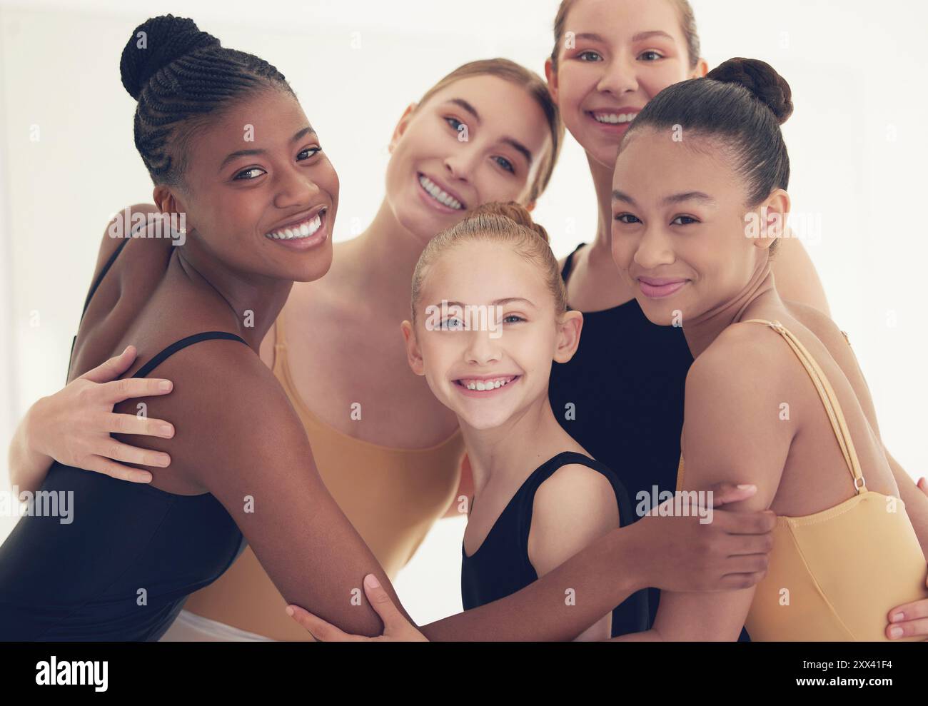 Girl, group and happy for ballet in portrait, class and hug with ...