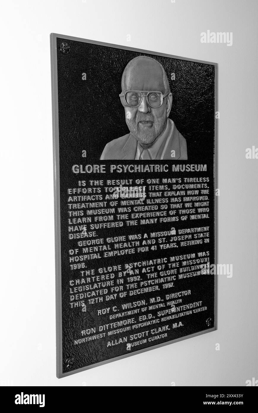 Plaque dedicated to George Glore on display at the Glore Psychiatric ...