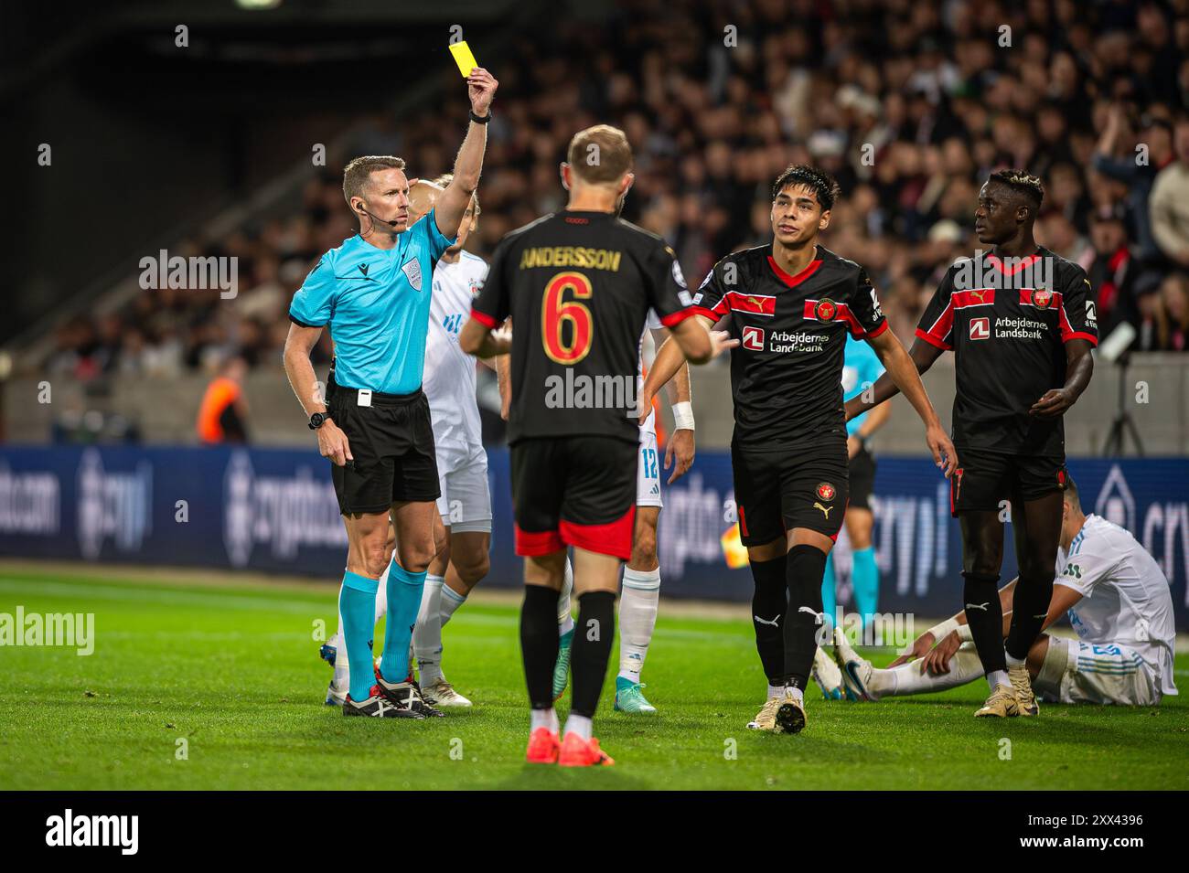 Herning, Denmark. 21st, August 2024. Referee Alejandro Hernandez books ...