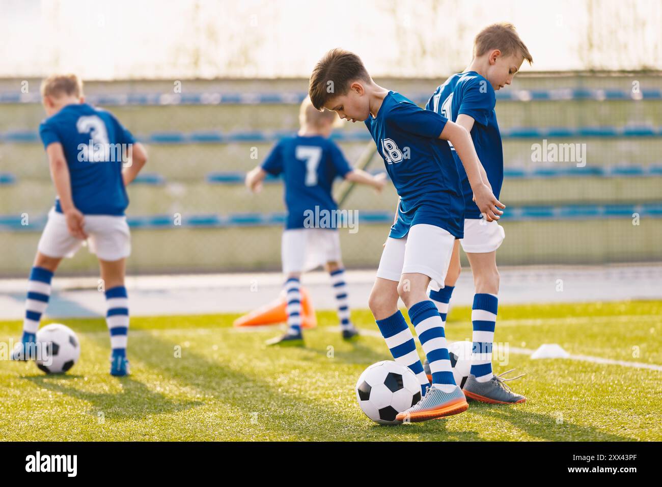 Soccer Kids in Team on Practice Unit. School Boys in Football Training ...