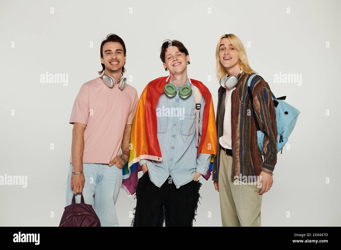 Three young students, part of the LGBTQIA community, stand in front of ...