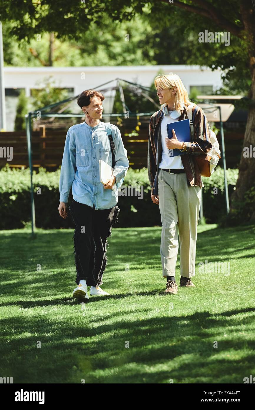 Two young friends walk side-by-side in a green park, enjoying the sun ...