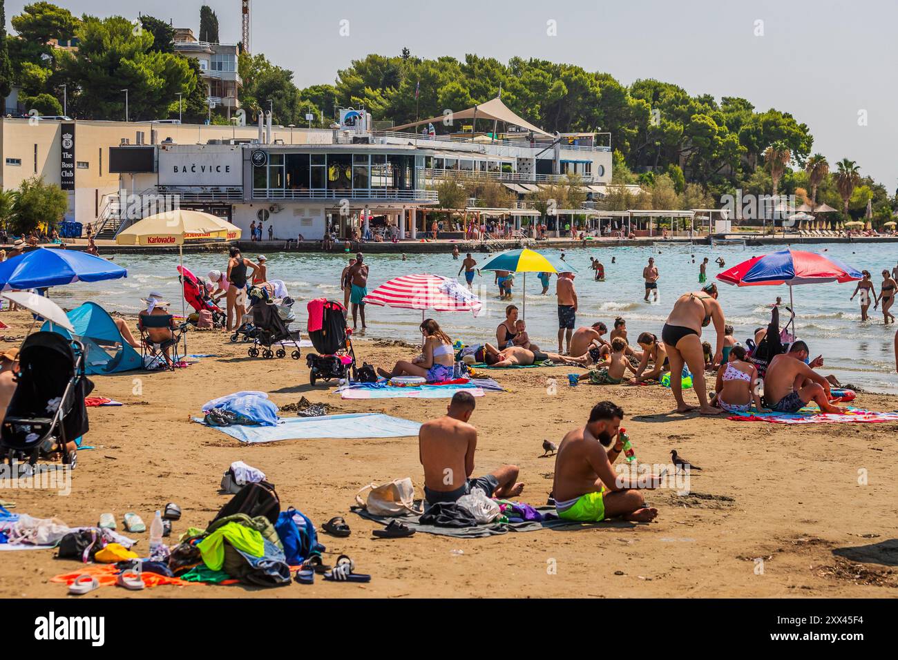 People enjoy swimming and sunbathing on the beach Bacvice in Split, Croatia on August 22, 2024 ...