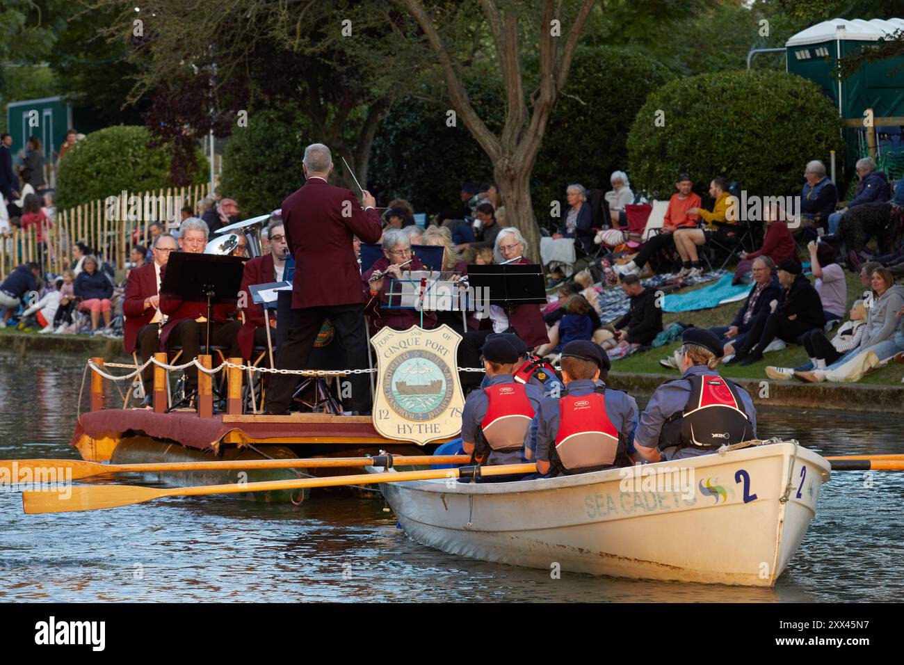 A procession of decorated boats and barges form a floating parade along ...