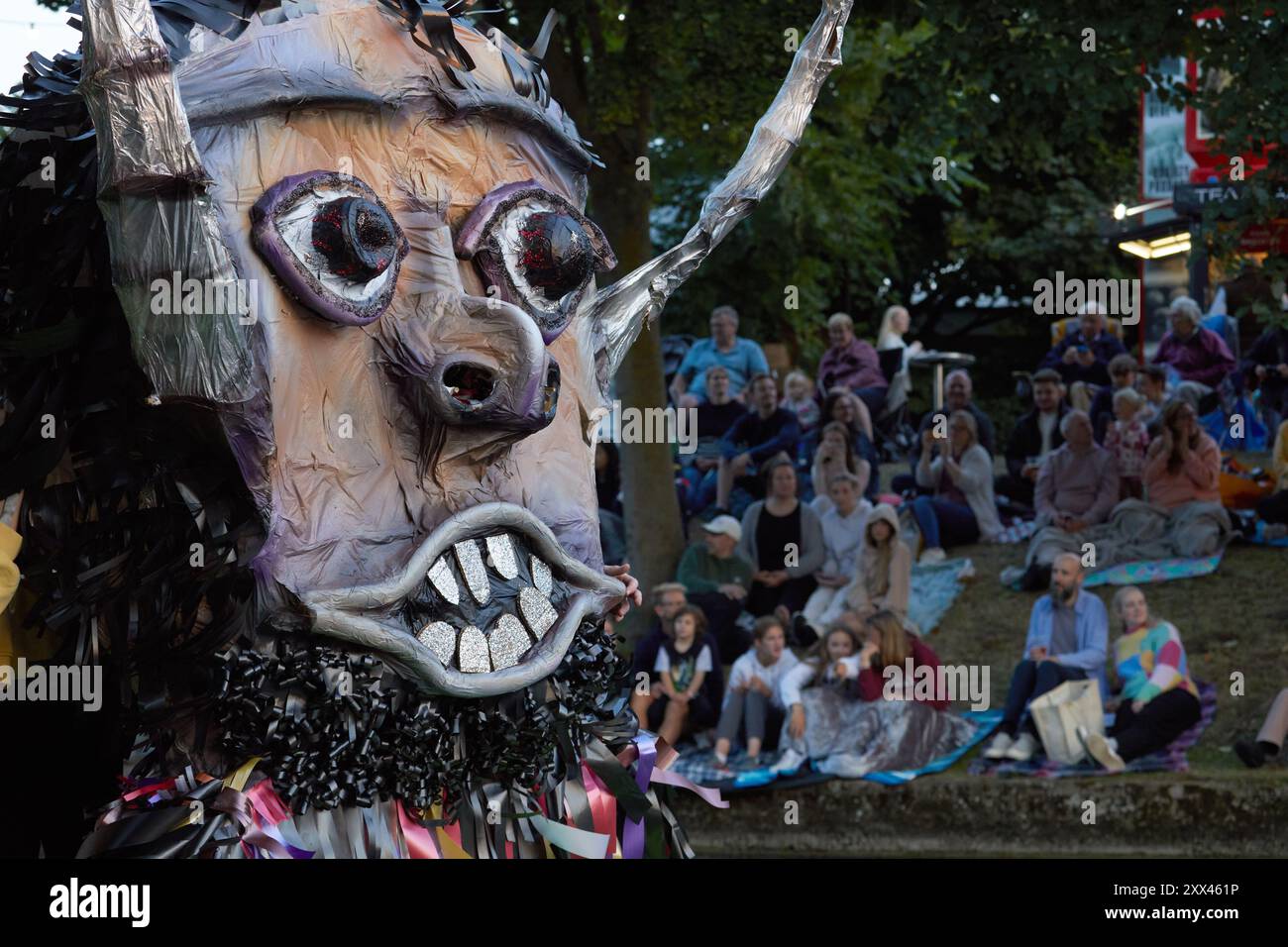 A procession of decorated boats and barges form a floating parade along ...