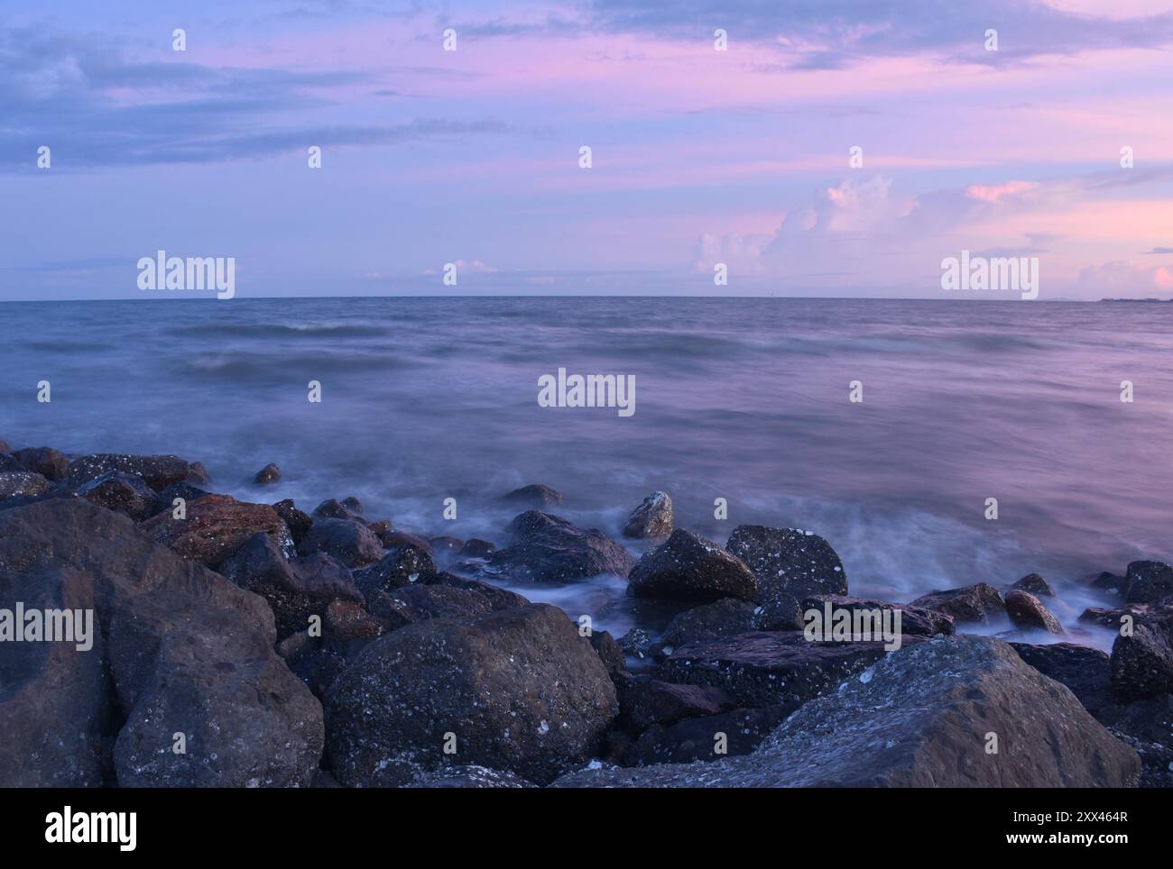 landscape of sea on sunset at tilted pole beach in Thailand Stock Photo ...