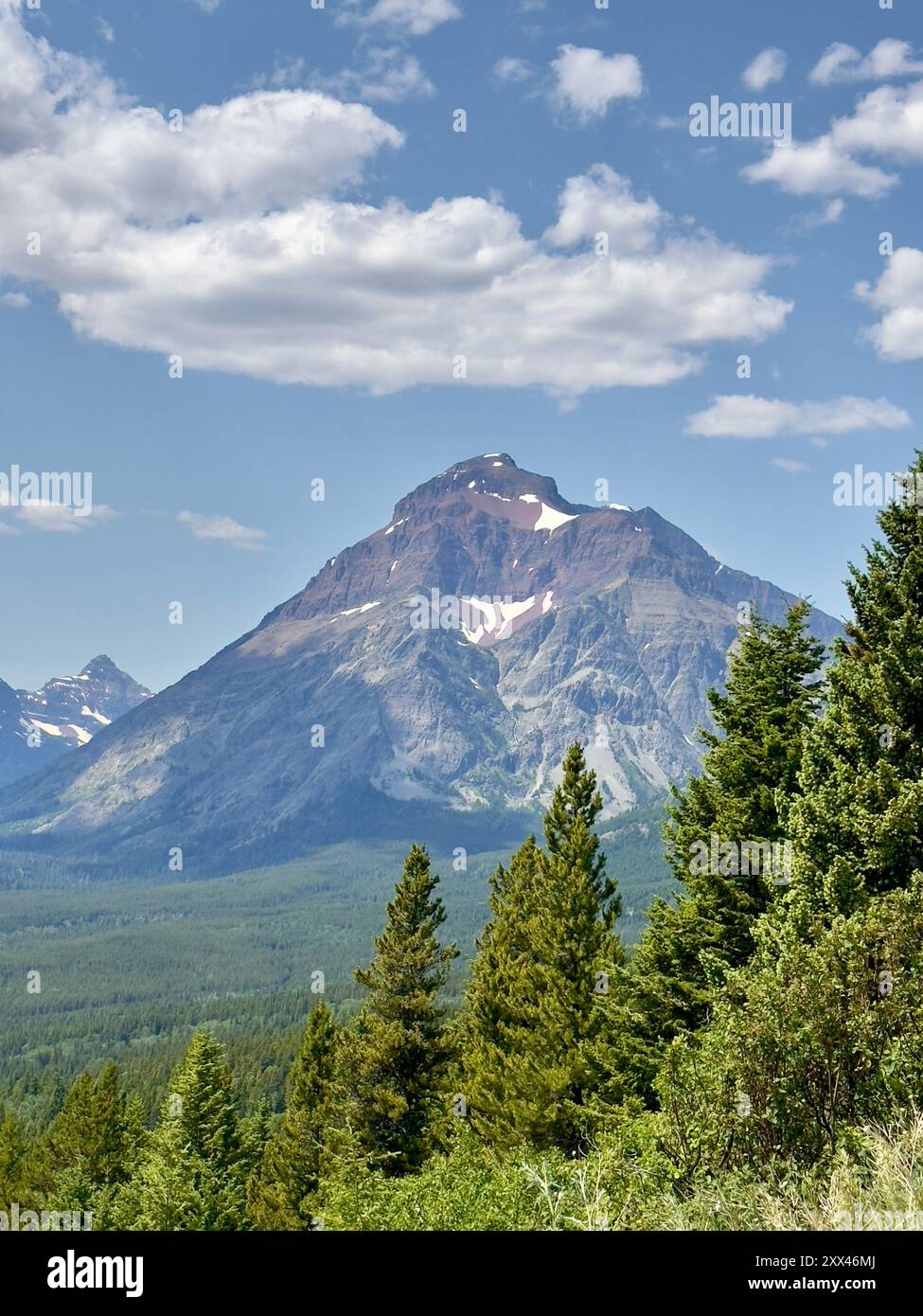 Single mountain jumps out from the landscape in Glacier National Park ...