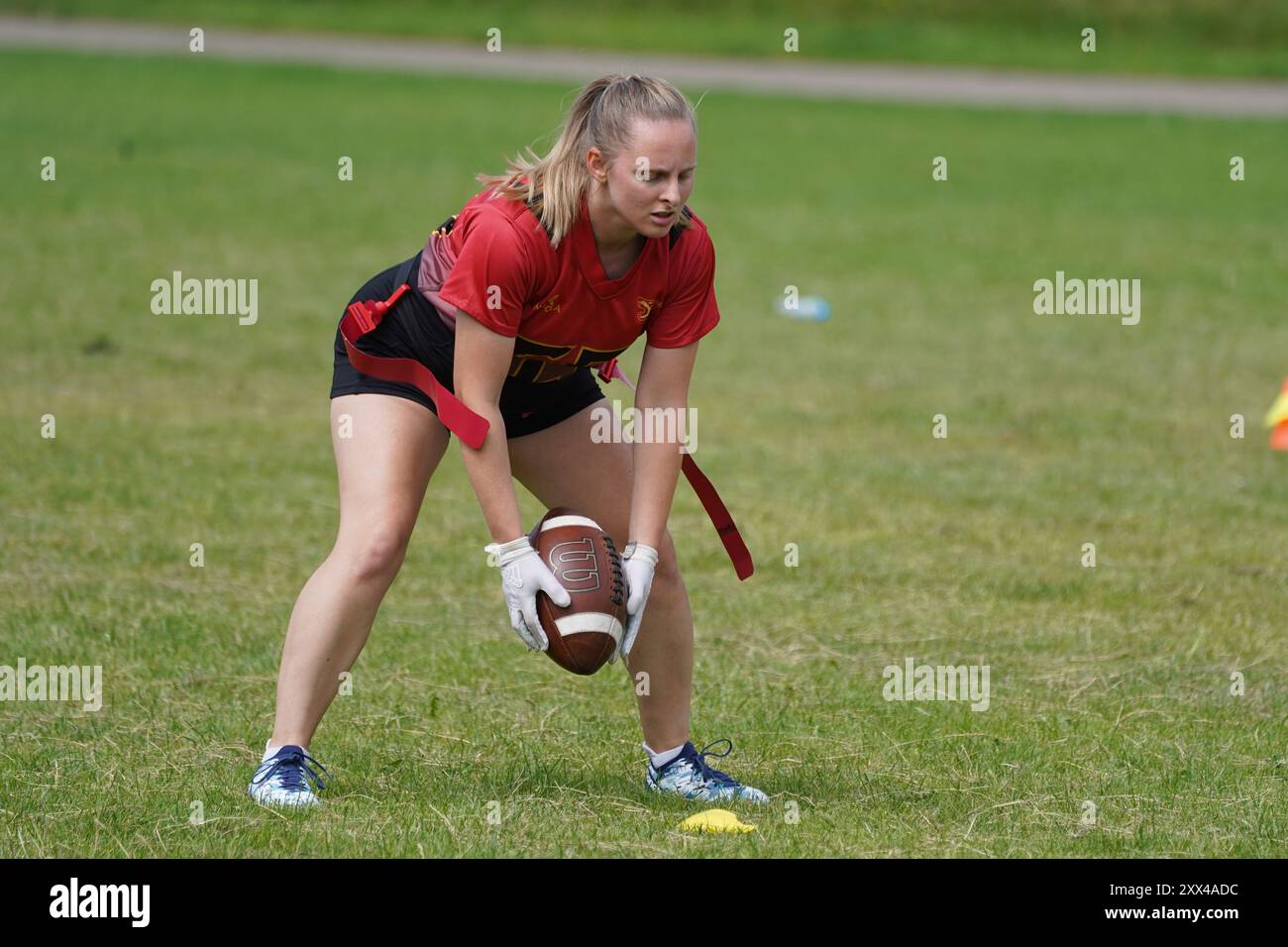 Female flag football player hi-res stock photography and images - Alamy