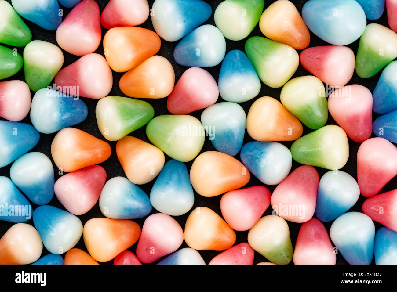 Crispy jelly. Top view pile of colorful sugar coated crispy jelly ...