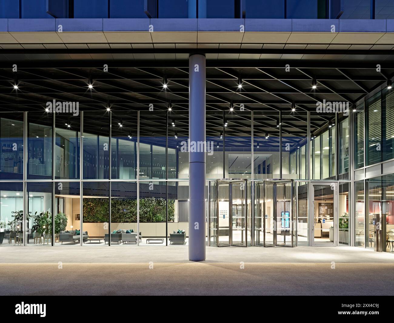 View towards main entrance and reception at dusk. Building 1180 ...