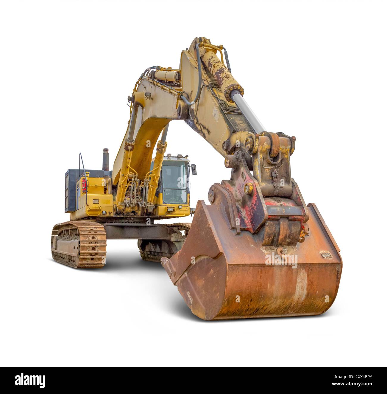 Dynamic shot of a yellow excavator with huge shovel in white back with ...