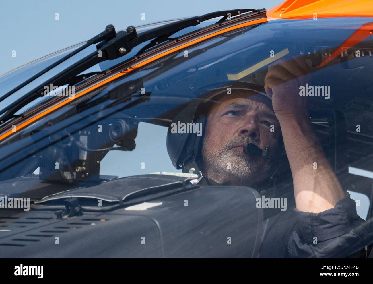 08 August 2024, Hesse, Frankfurt/Main: Pilot Jochen Sturm sits in the ...