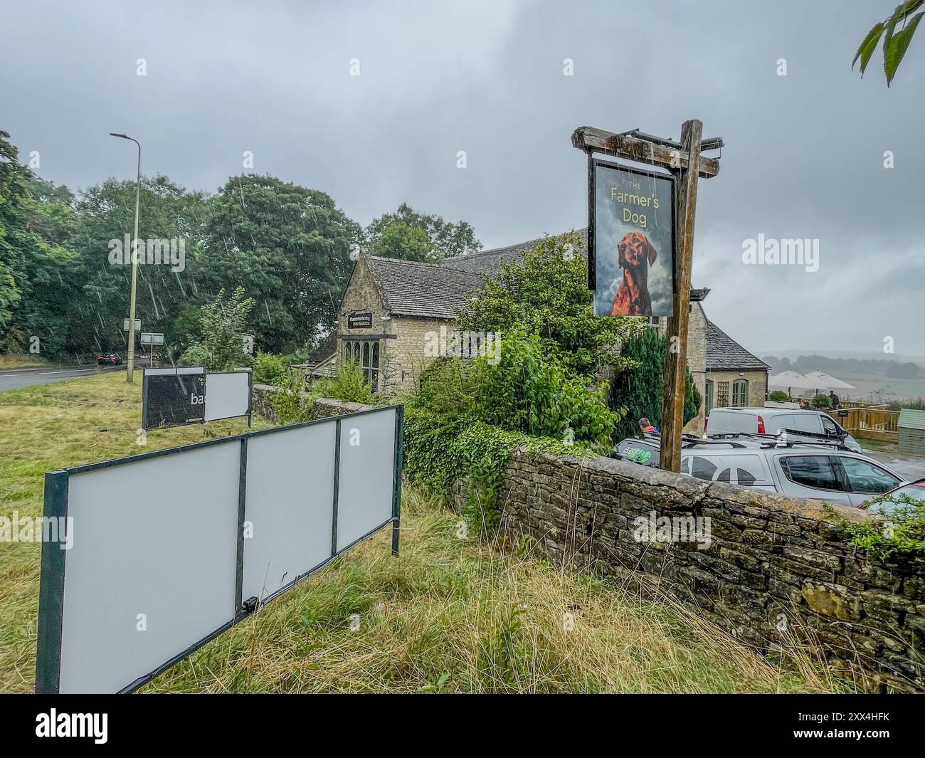 A sign for Jeremy Clarkson's new pub, The Farmer's Dog, near Burford in ...
