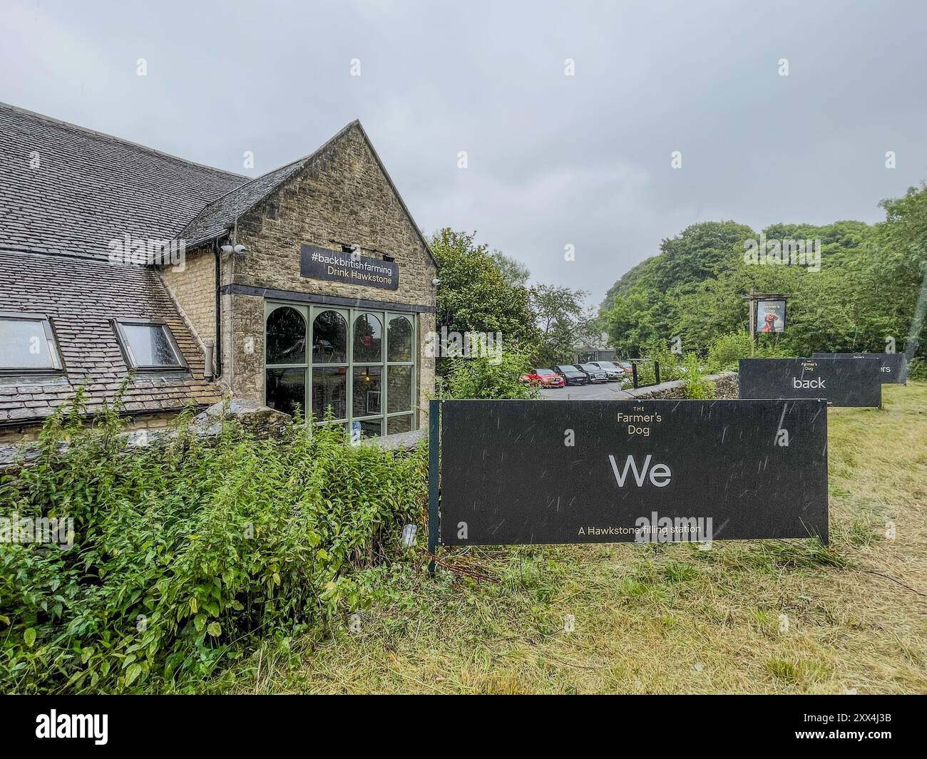 A sign for Jeremy Clarkson's new pub, The Farmer's Dog, near Burford in ...