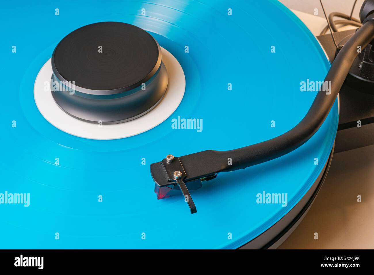 Coloured vinyl record spinning on a hifi turntable: Phillip Roberts ...
