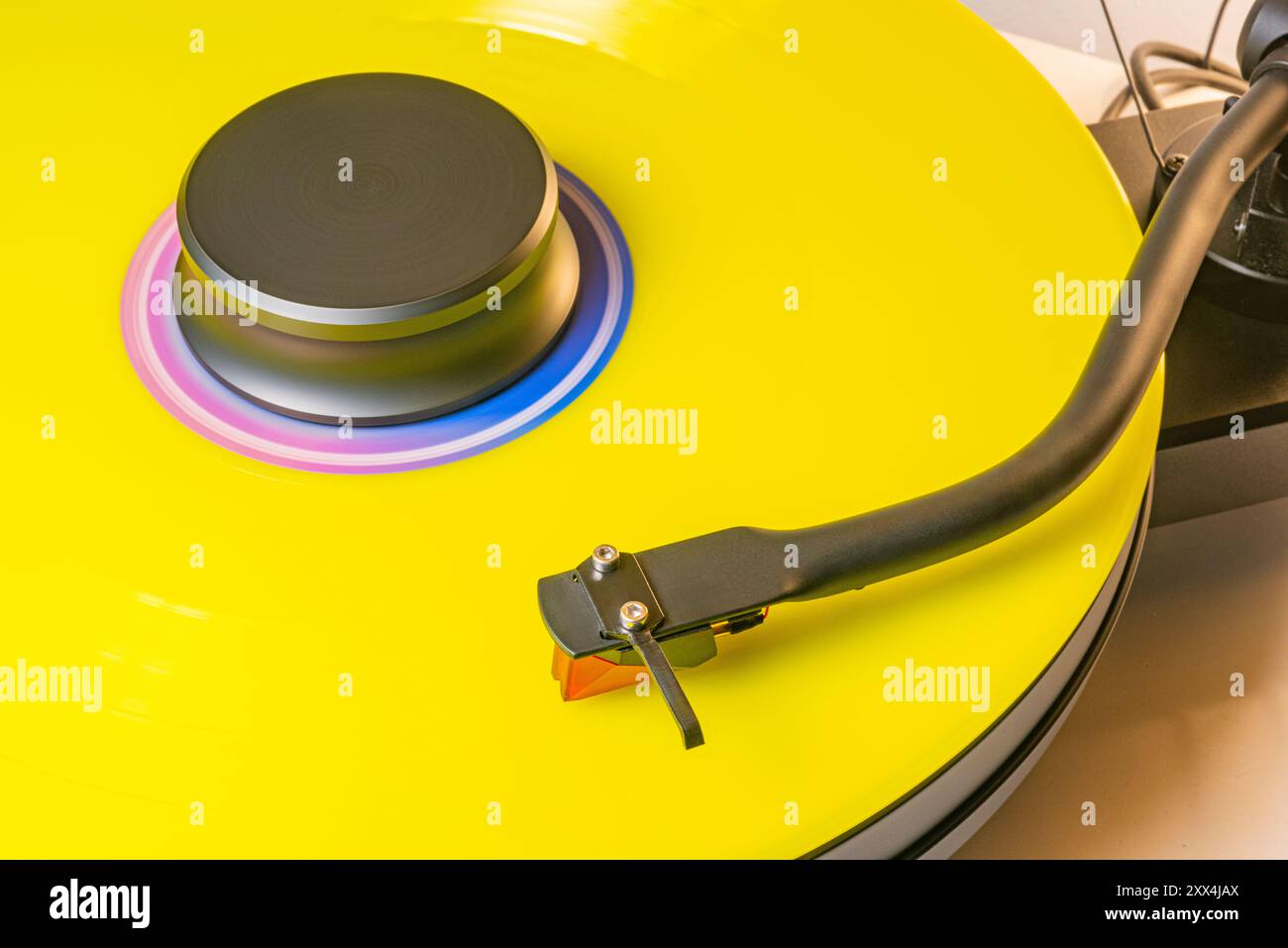 Coloured vinyl record spinning on a hifi turntable: Phillip Roberts ...