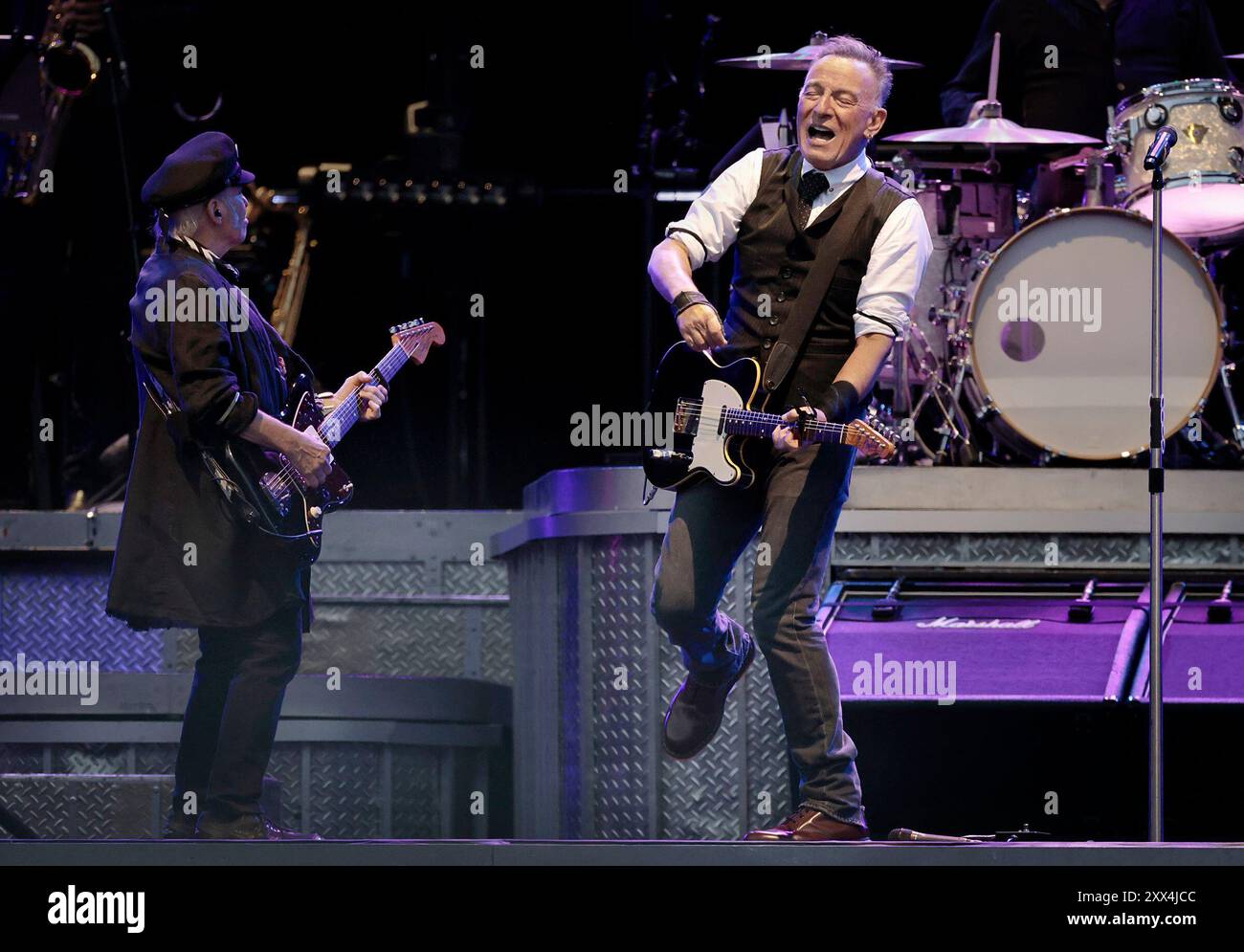 (L-R) Nils Lofgren and Bruce Springsteen performing during the Bruce ...