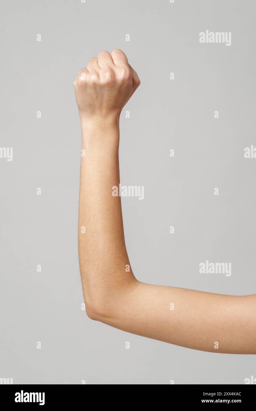 Close Up of a Woman's Arm Extended Upward Stock Photo - Alamy