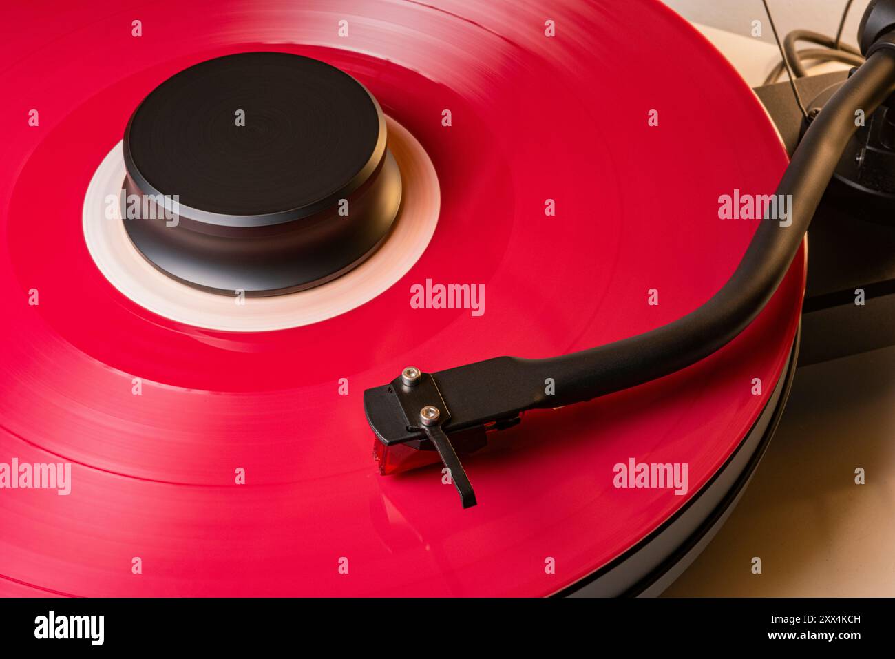 Coloured vinyl record spinning on a hifi turntable: Phillip Roberts ...