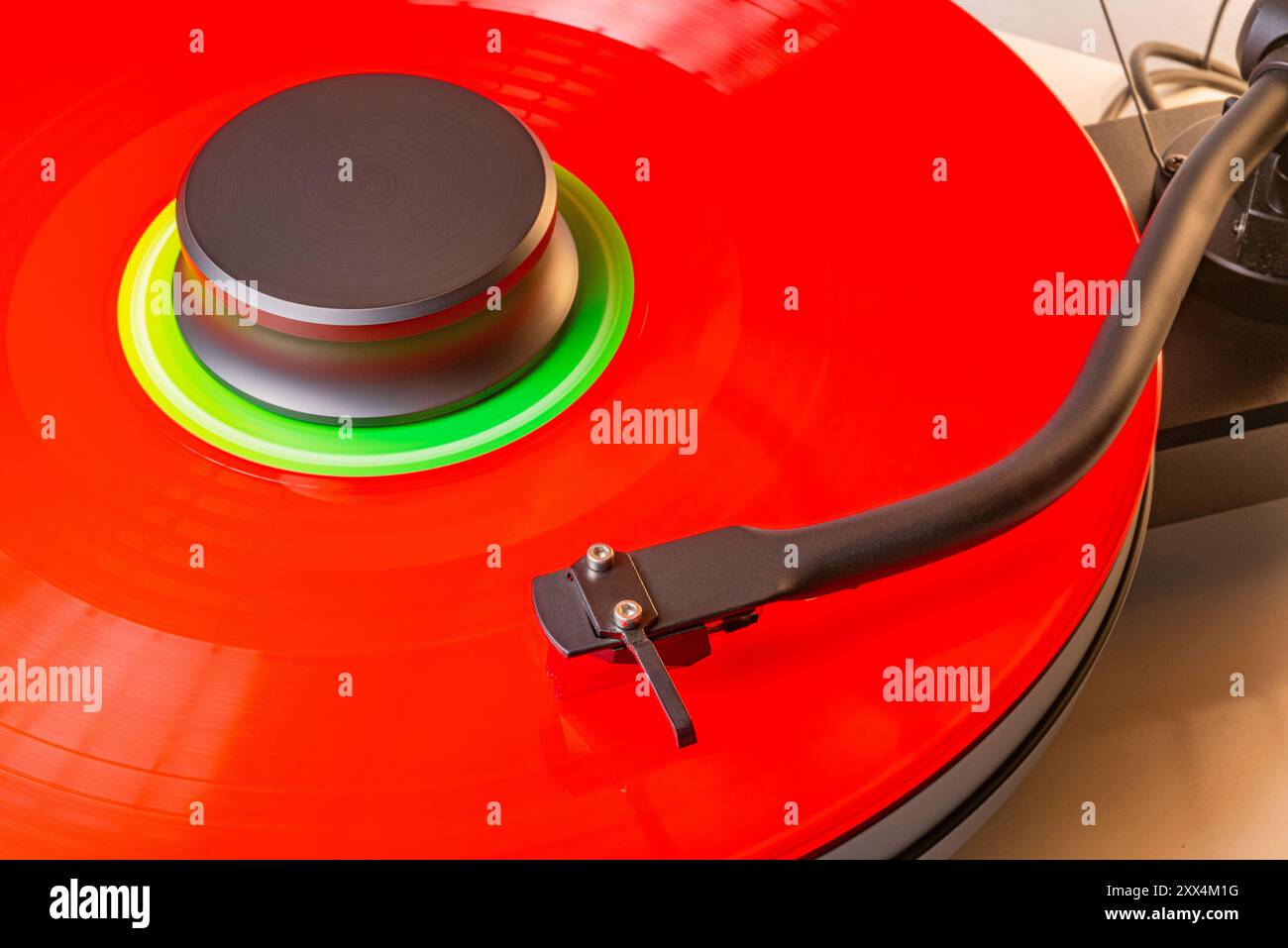 Coloured vinyl record spinning on a hifi turntable Stock Photo - Alamy