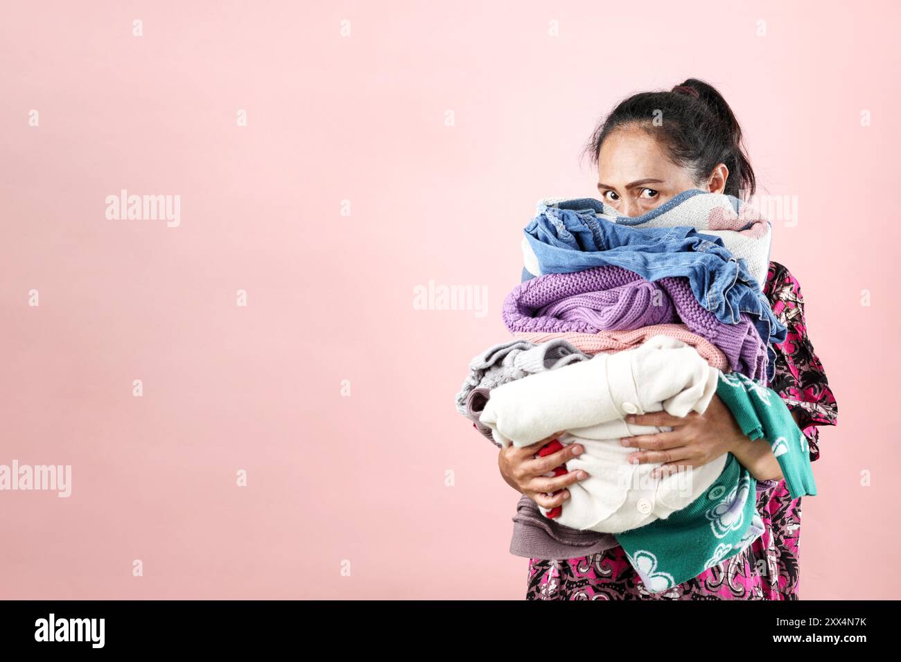 Asian House Maid Hiding from Wrinkled Clothes Laundry with Bombastic ...