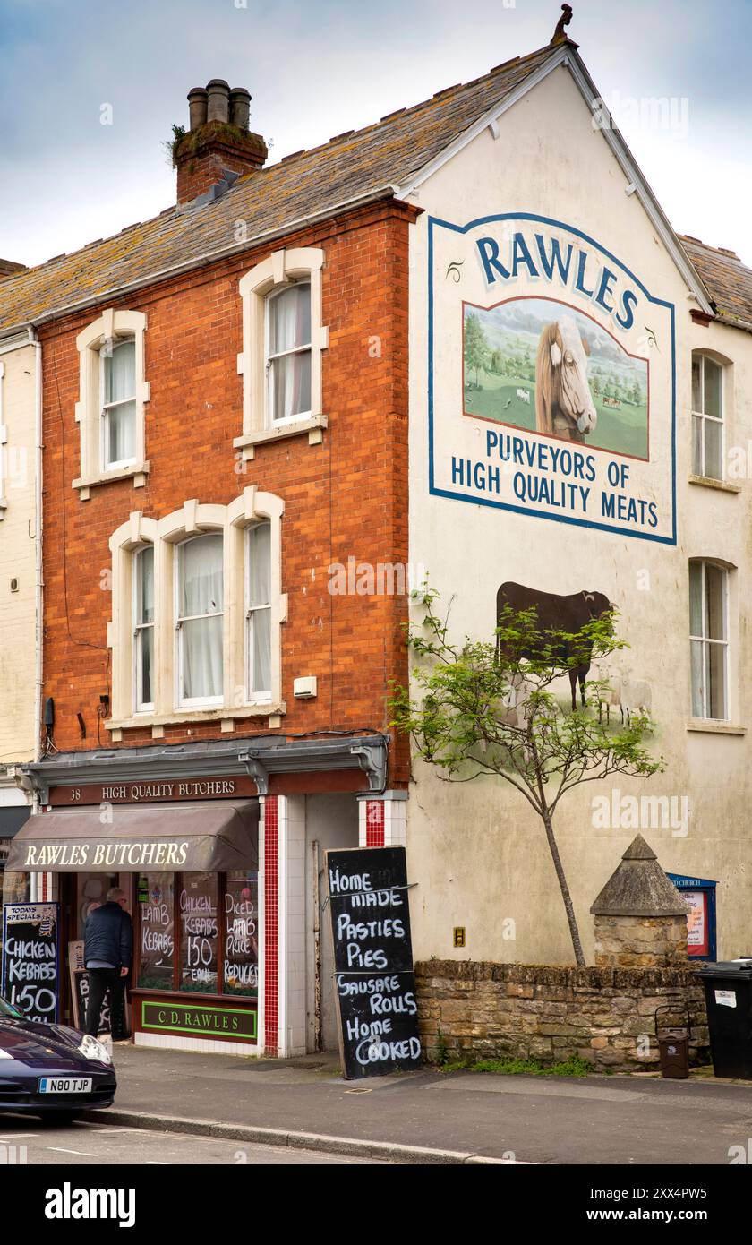UK England, Dorset, Bridport, East Street, Rawles Butcher’s shop with ...