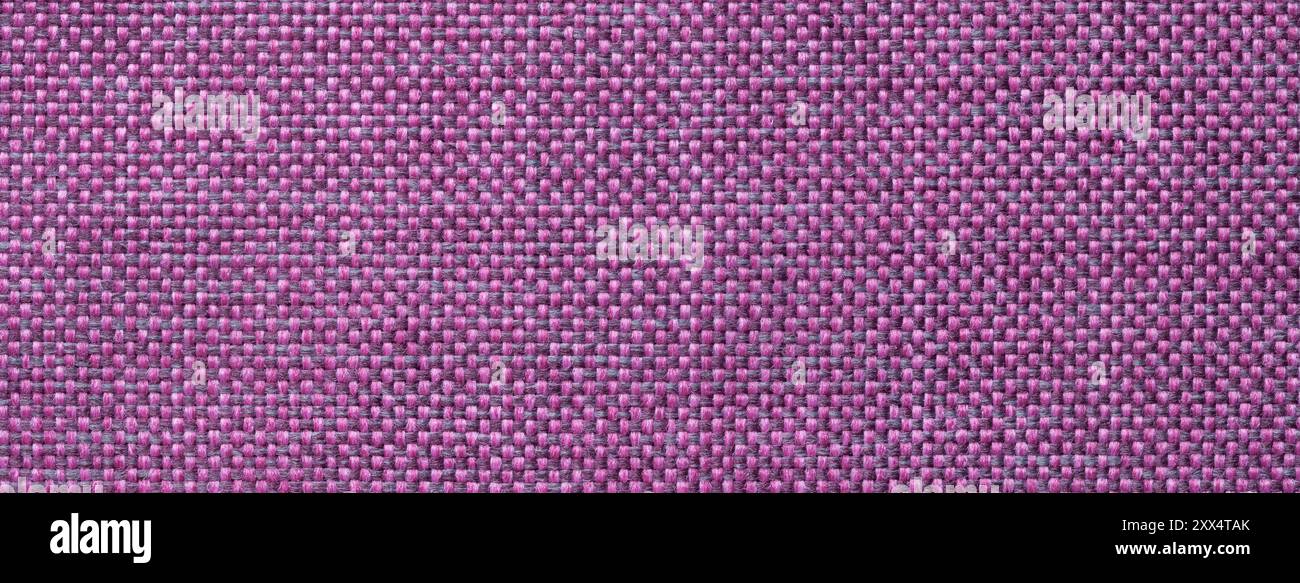 Dark violet woolen background of dense woven bagging fabric, closeup ...