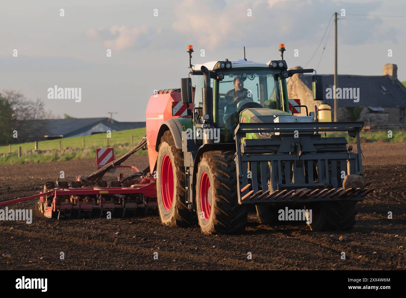 The Front View of a Green Fendt Tractor Sowing Barley with a Horsch ...