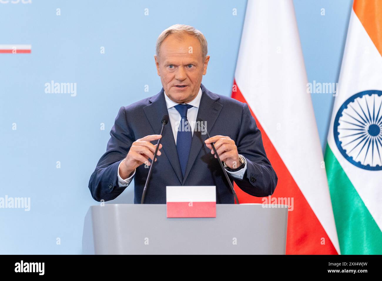Prime Minister of Poland, Donald Tusk gestures as he speaks to the media during a press ...